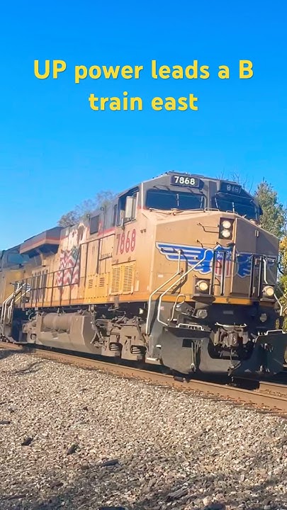 UP 7868 leads a CSX train - YouTube