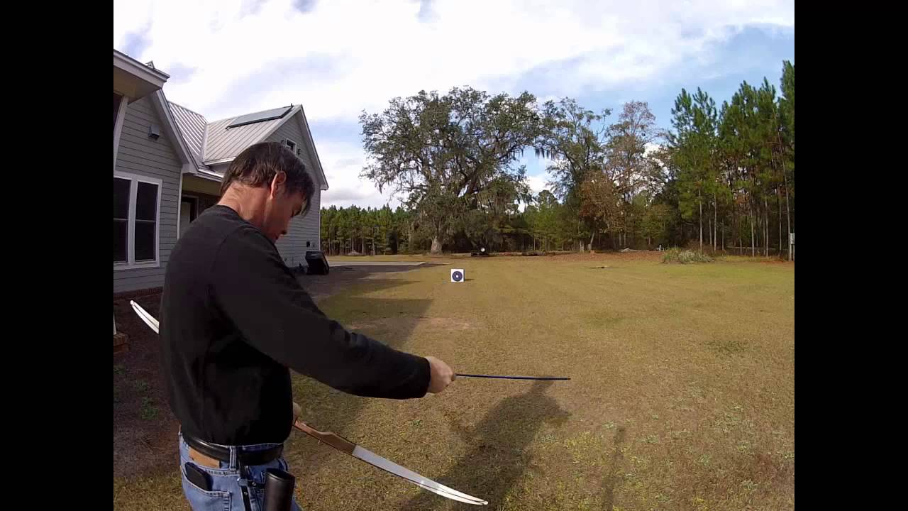 First shots with my new Ragim Wildcat takedown recurve bow (30#) - YouTube