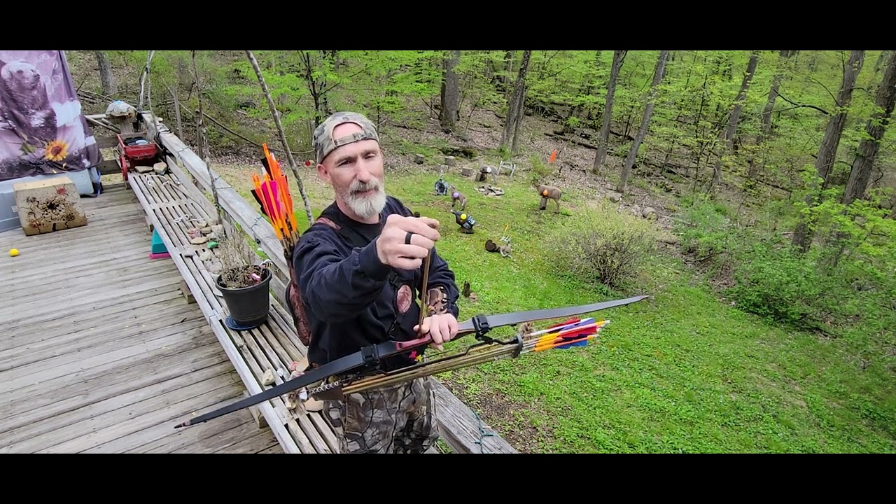 Traditional archery.....slow it down. Aim small. - YouTube