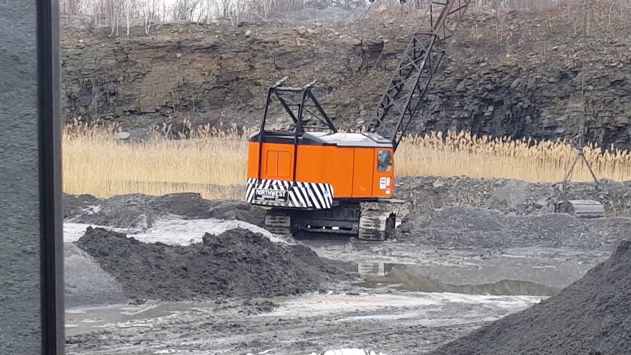 Caterpillar 980K & North West drag line cleaning the pond. - YouTube