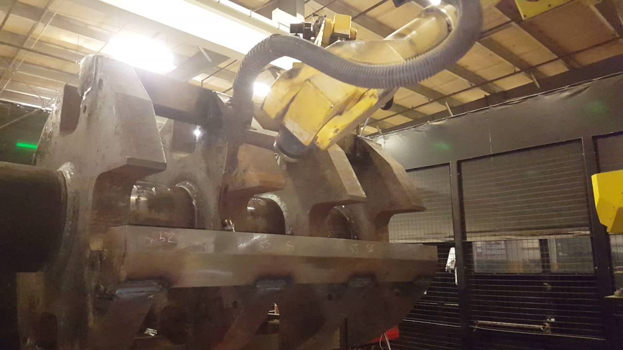 Fanuc M710iC 20L dual arm robot performing touch sensing - YouTube