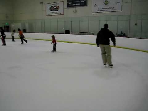Megan Ice Skating (half swizzle pumps on a circle) - YouTube
