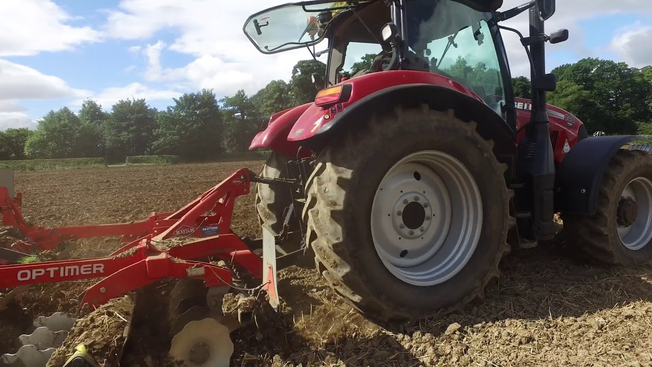 Discing for grass seeds with Case 140 and Kuhn Optimer - YouTube