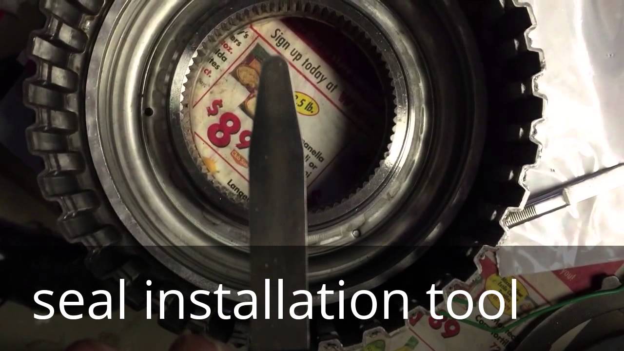 Ford AXODE AX4S transmission using a seal tool for the clutch drum ...