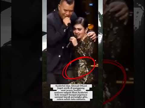 AHMAD DHANI DAN SYAHRINI NEMPEL KAYA PERANGKO