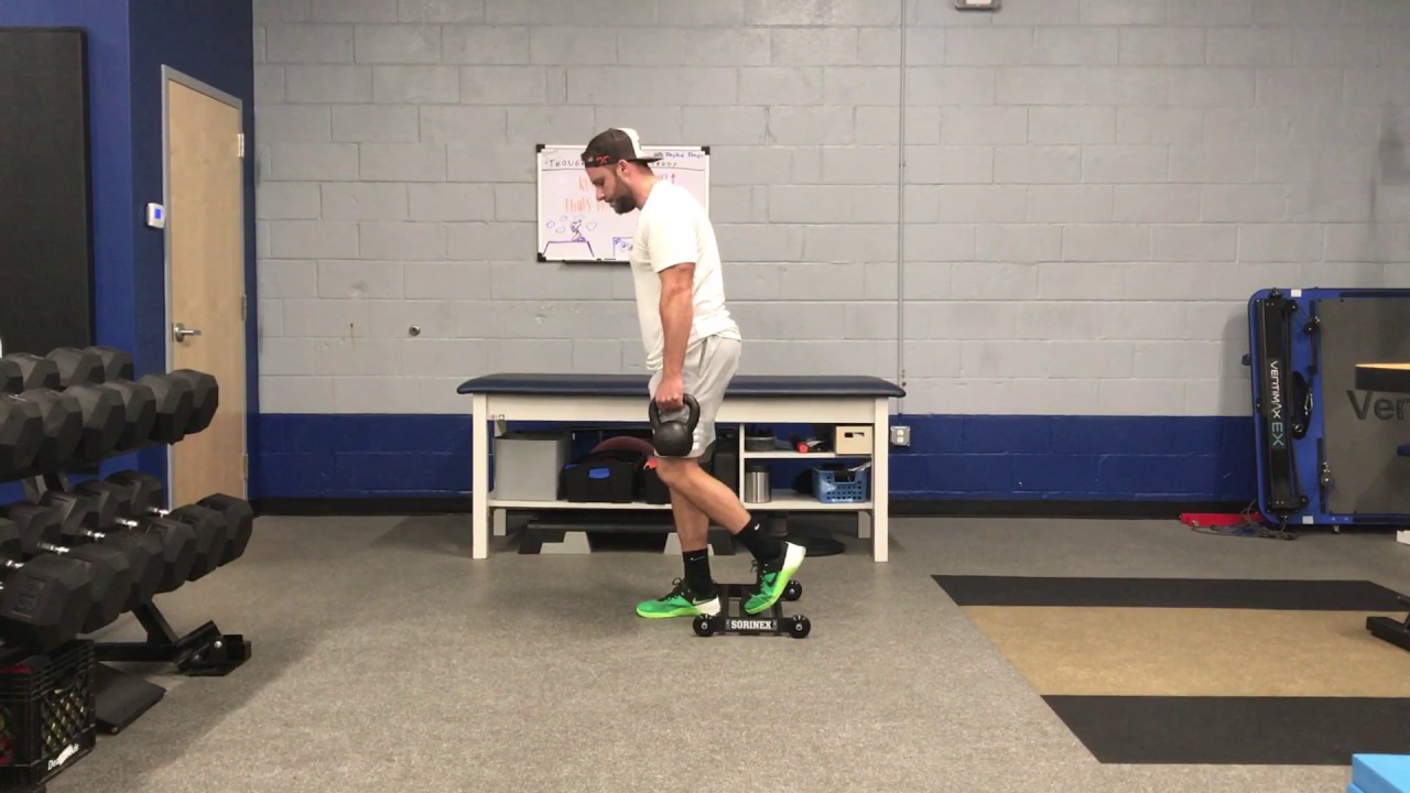 Single leg RDL with back foot on roller (hamstring rehab stretch ...