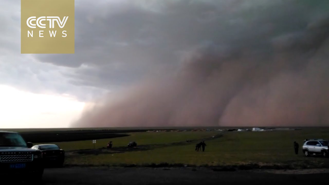 Thousands flee from 100-meter wall of sand in North China - YouTube