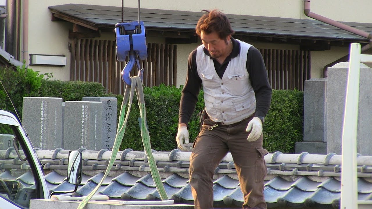 Moving grave stones in a Japanese Buddhist cemetery - 日本の仏教の墓地に墓石を動かす ...