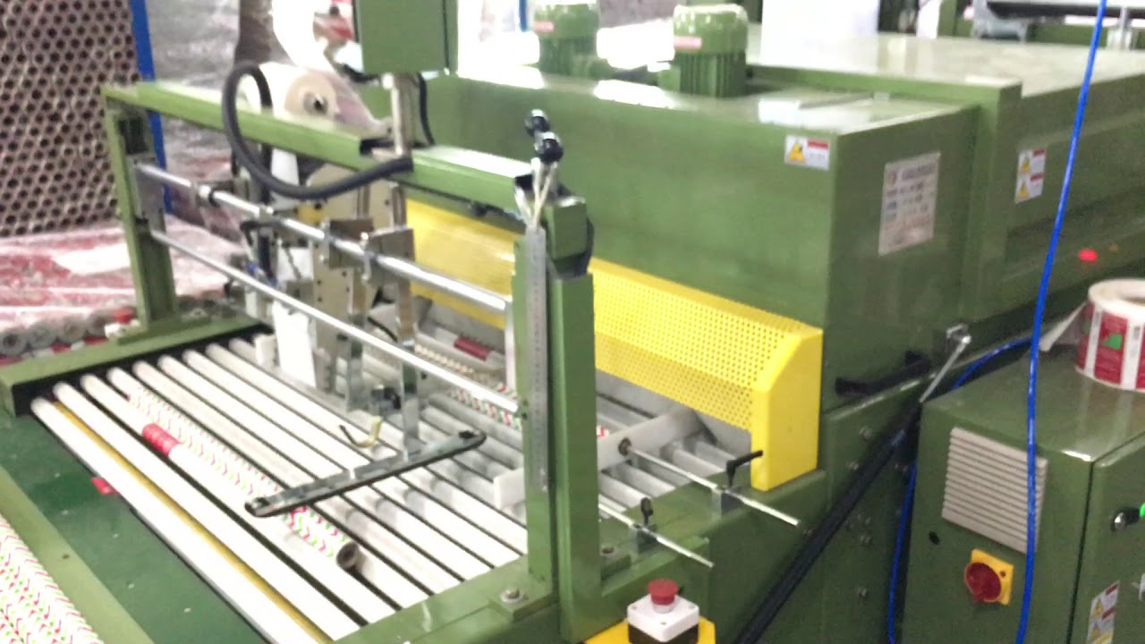 Gift paper rewinding machine and shrink wrapping machine in customer's ...
