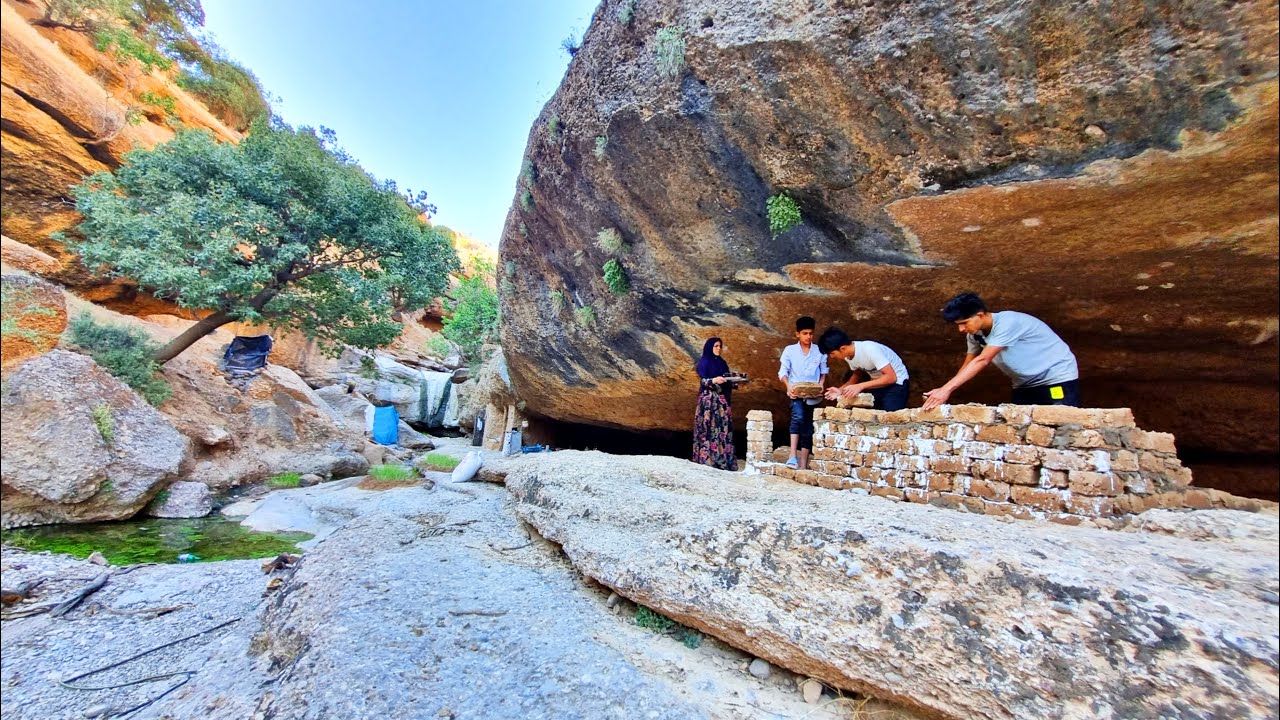 Building a shelter under the cave with clay and living in it during the ...