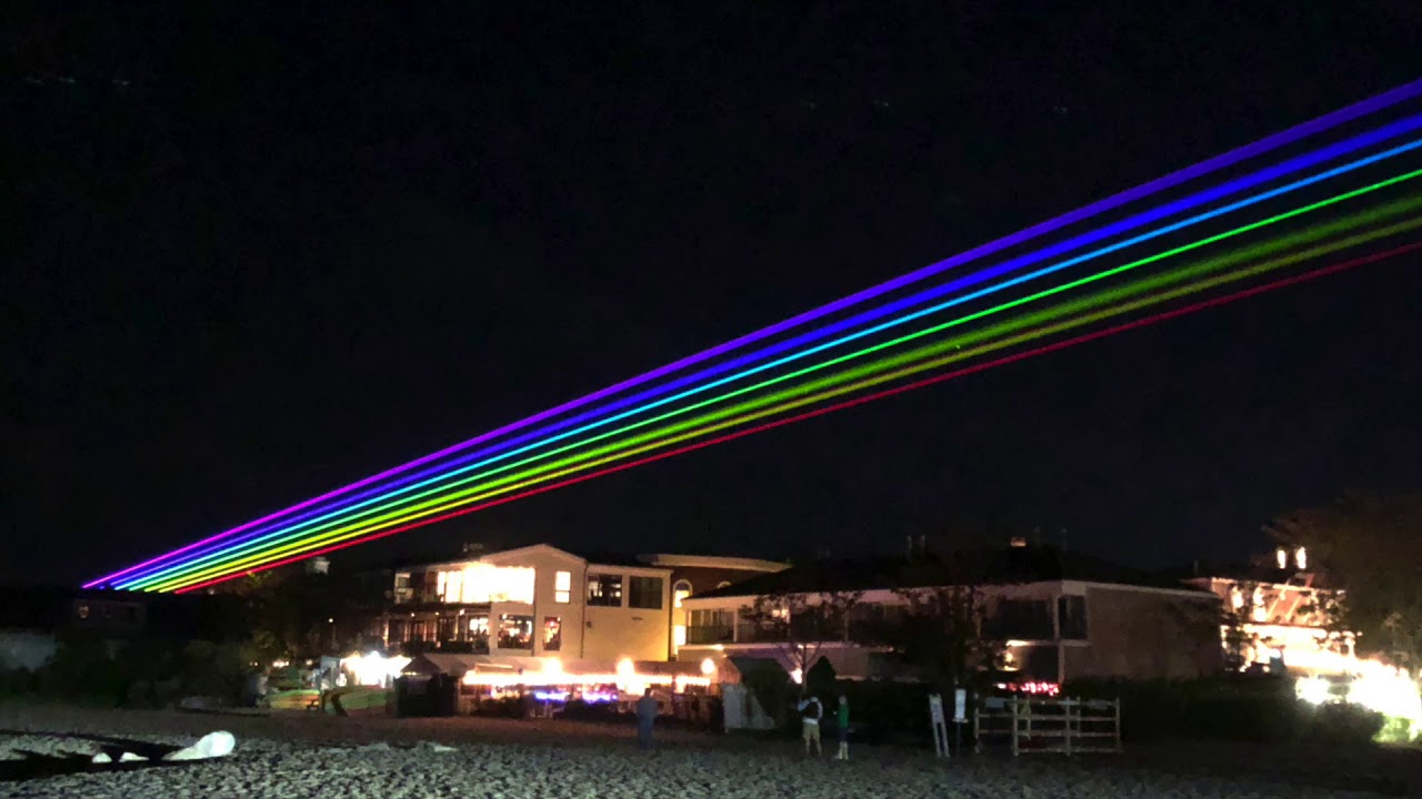 Rainbow laser artwork illuminates Provincetown - YouTube