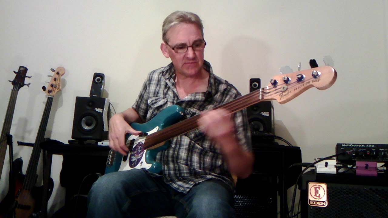 Mike Taylor Fretless Bass, played mainly in Welsh - YouTube