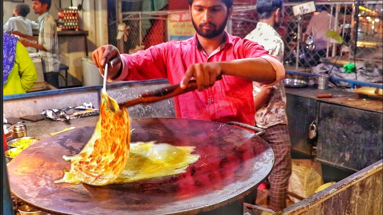Roadside Randomly Prepared Fusion Egg Roll | Laccha Paratha Egg Veg ...