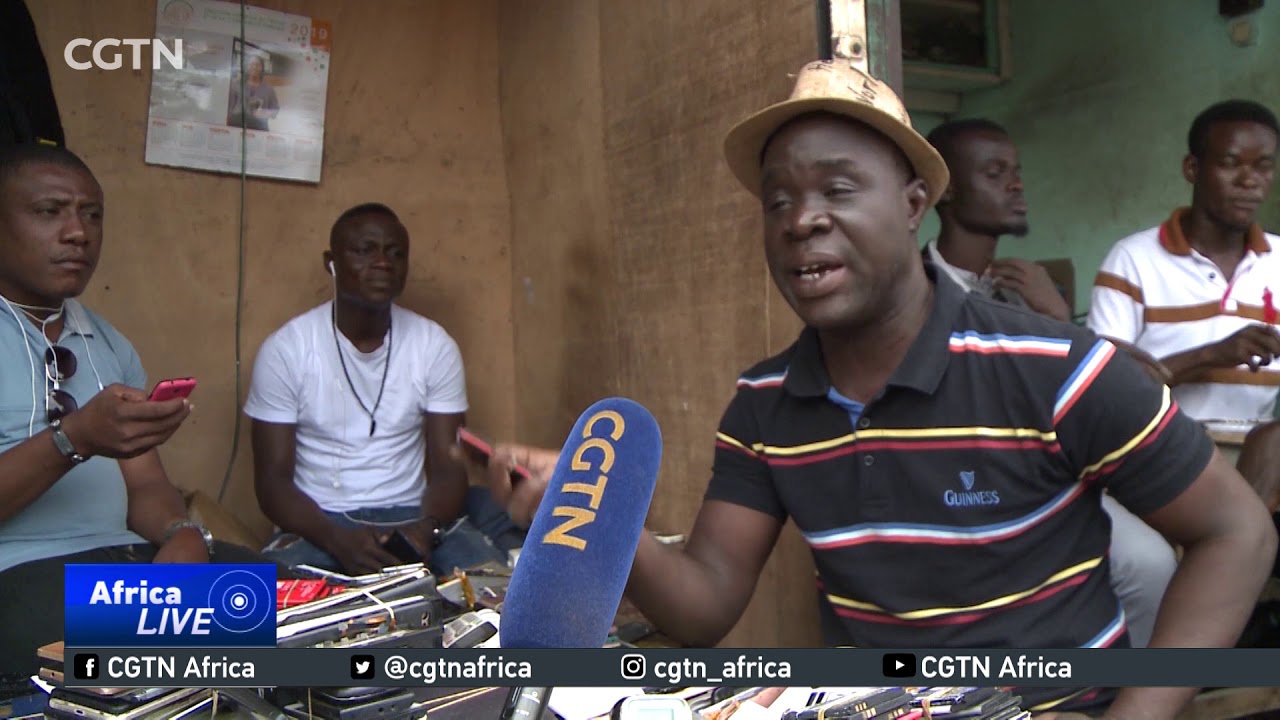 Young Ivorian turns mobile phones into art objects - YouTube