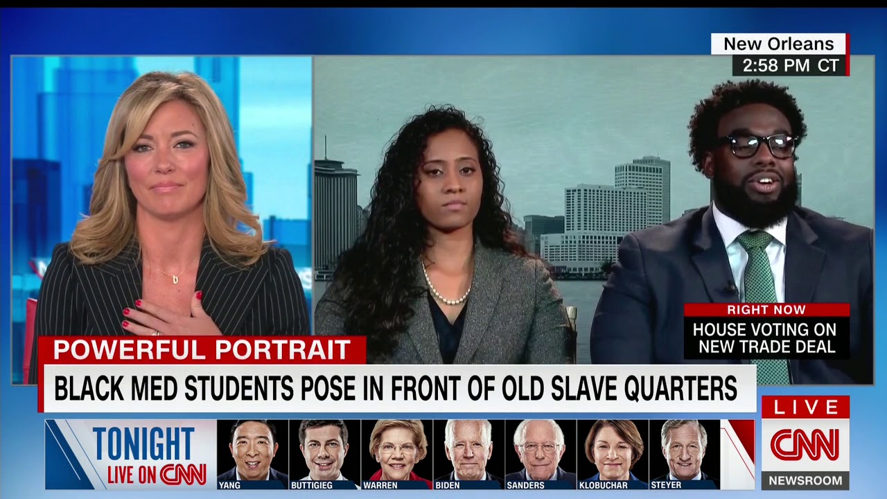 Students pose in front of old Slave Quaters, featuring Bro Russell ...