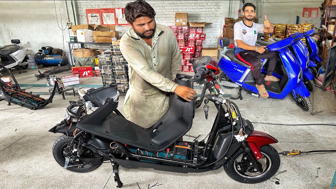 The local factory manufactures electric motorcycle with a range of 200 ...