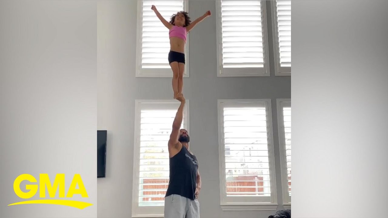 This dad-daughter cheerleading stunt duo are some serious squad goals l ...