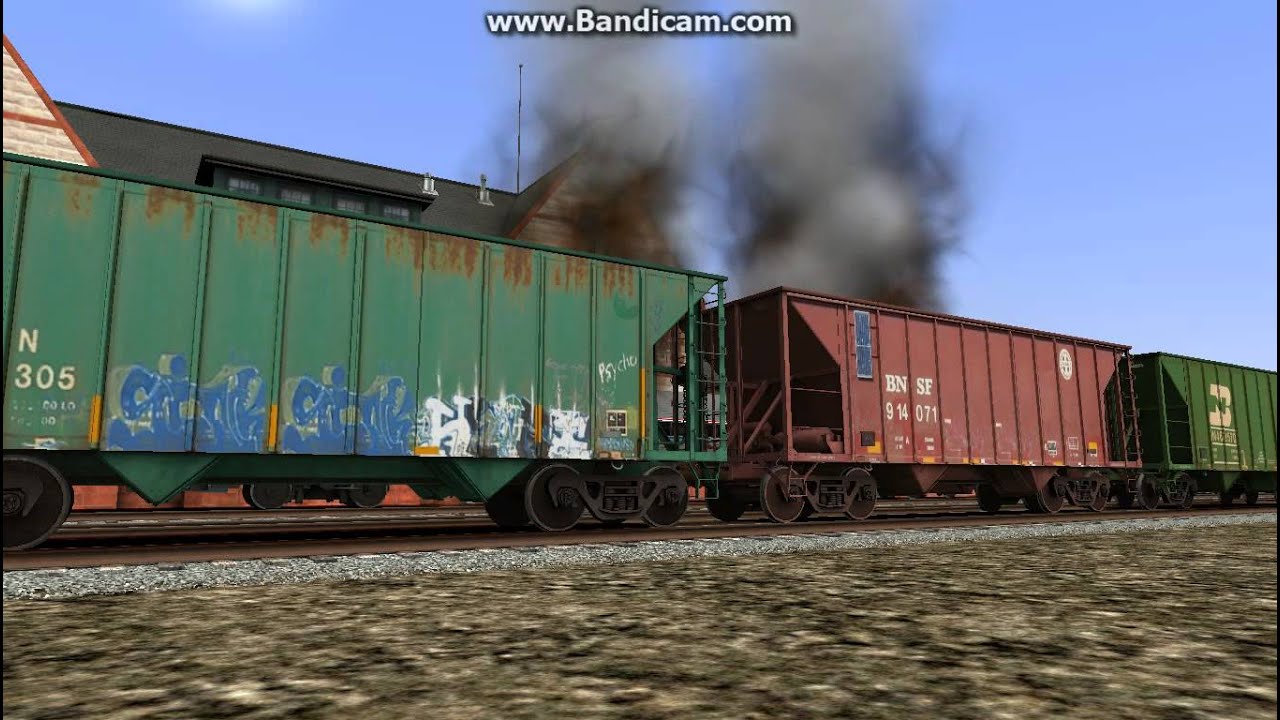 (TS2013) BNSF Ballast train passes a 'flaming' Amtrak train - YouTube