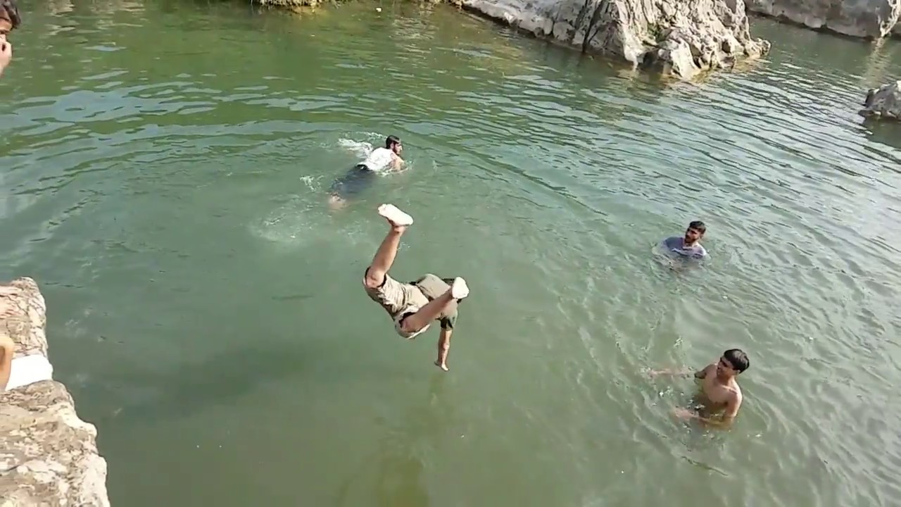 Jumping into Pond - YouTube