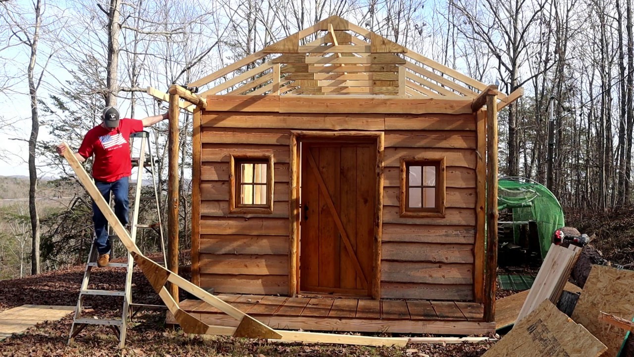 Rafters off lowered and decking back on the rustic cabin. - YouTube