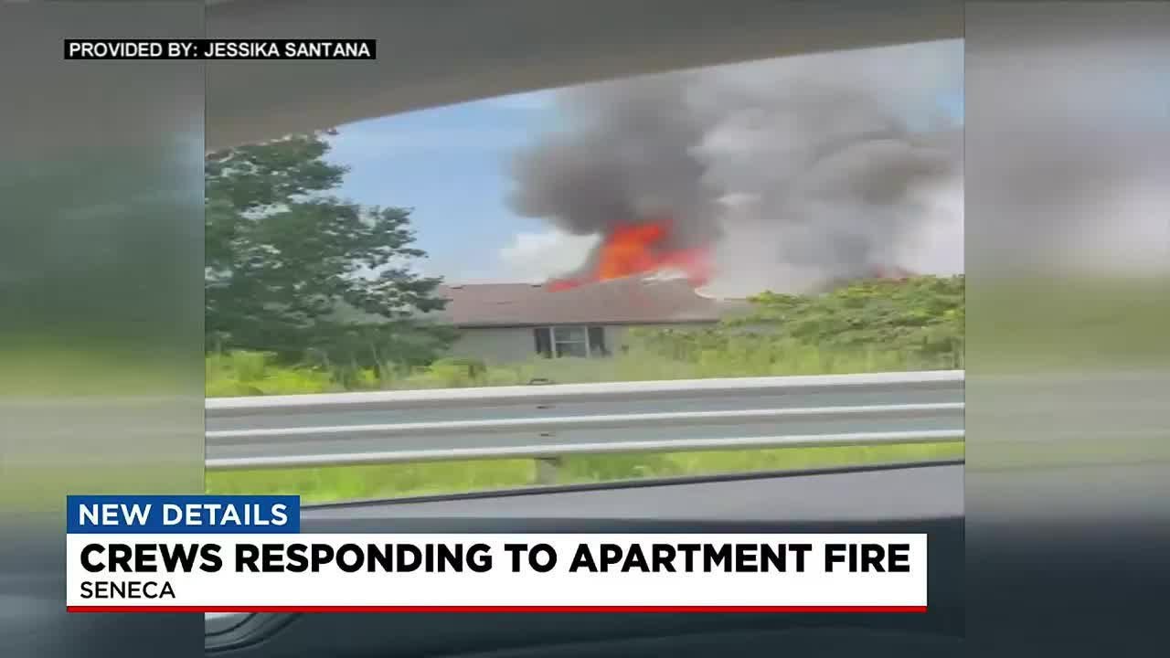 Crews respond to large apartment fire in Seneca - YouTube