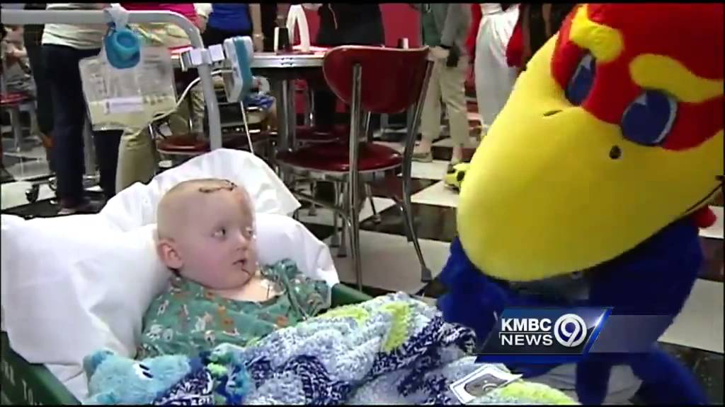 Mascots visit with young hospital patients - YouTube