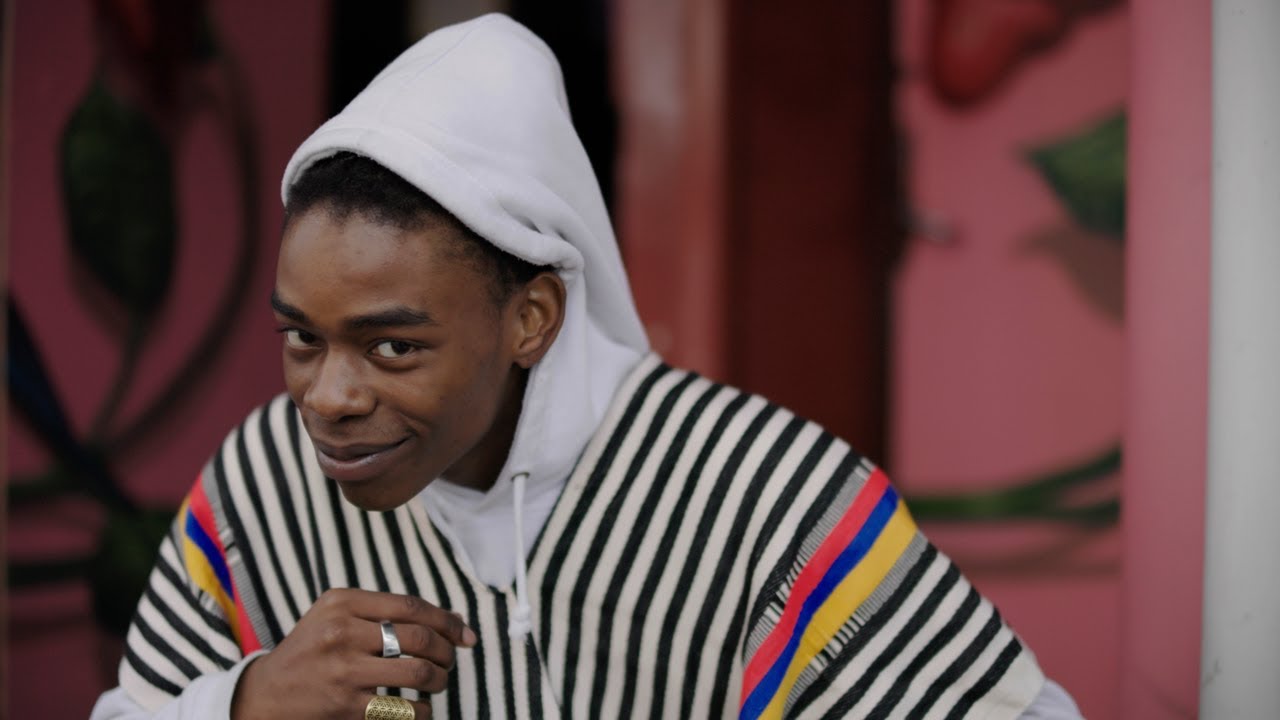 Waguan raps about social justice while making you dance - YouTube