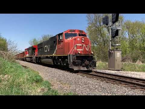 CN 5721(EMD-SD75I) & CN 2205(GE-C44-9W) Lead a SB Mixed Manifest on the CN Waukesha Sub on 5/10 ...