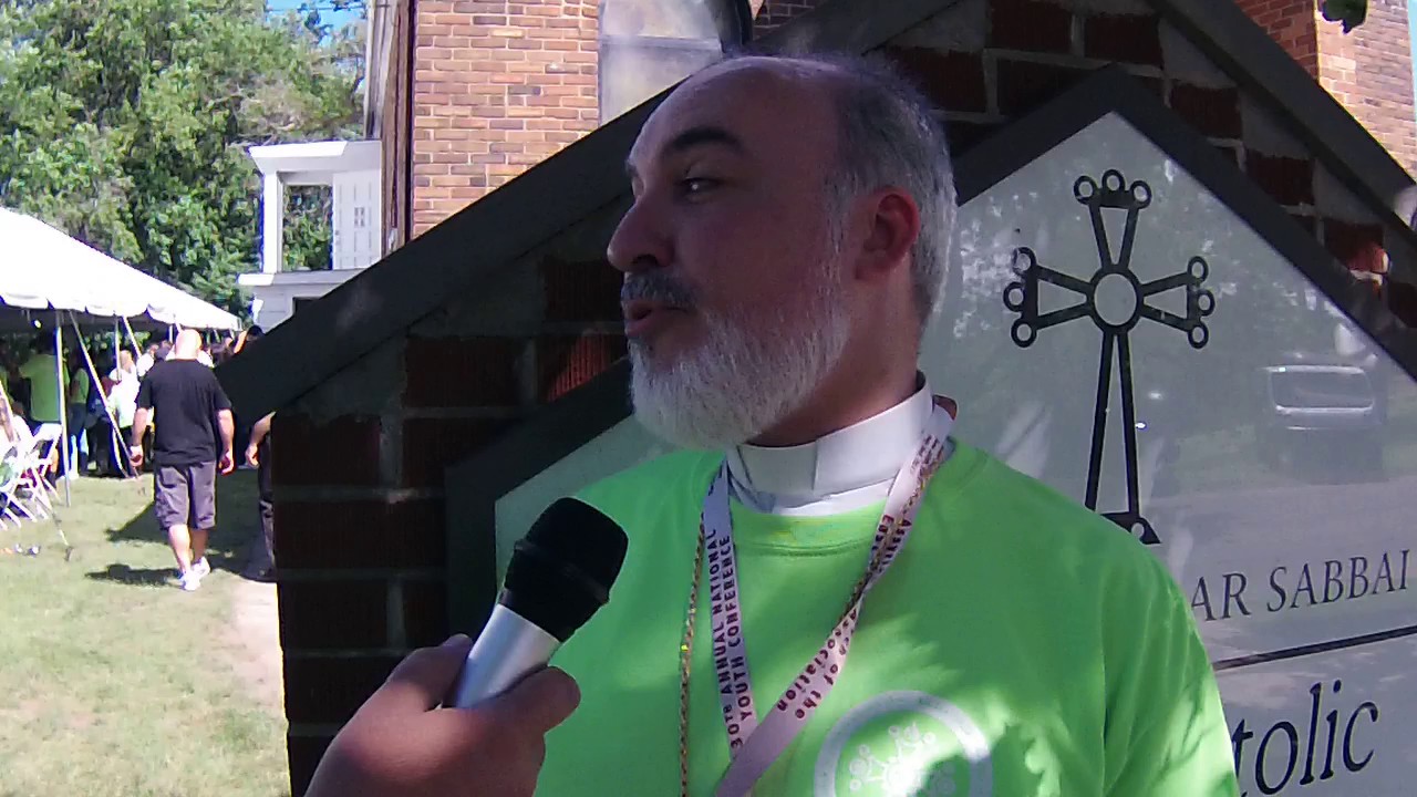 Christopher with Bishop Mar Awa Royel - YouTube