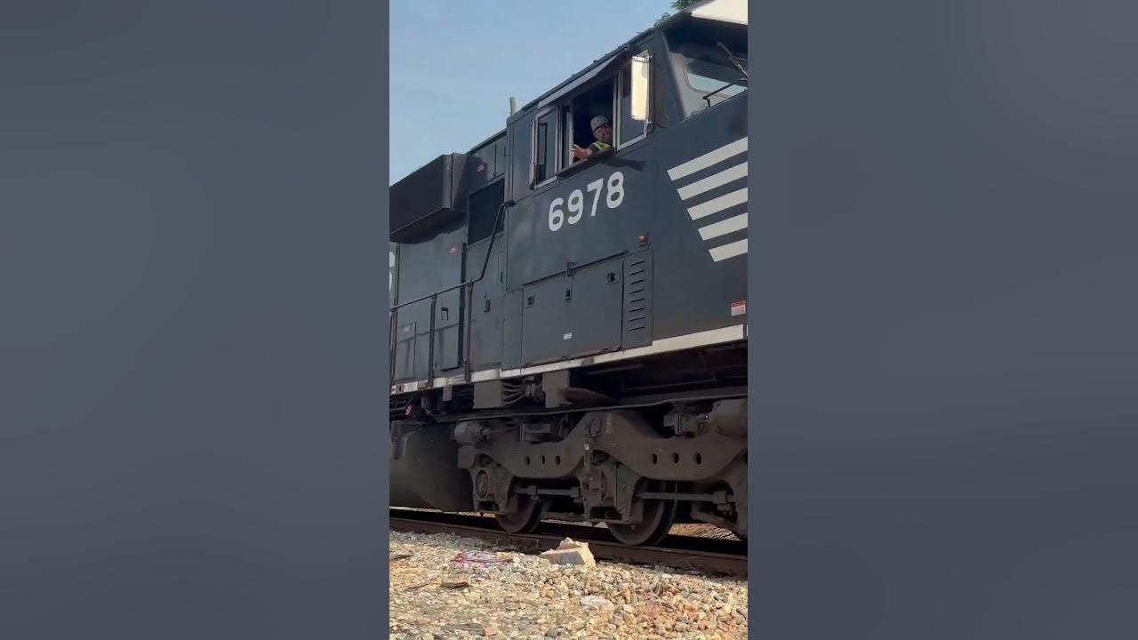 NS 6978 SD60E gives a horn salute & a wave as it leads a local train west on the cedartown ...