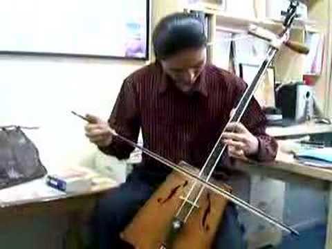 Hongor playing the Horse Head fiddle (Morin Khuur)