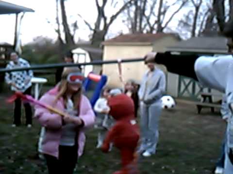 elmo hit with a stick - YouTube