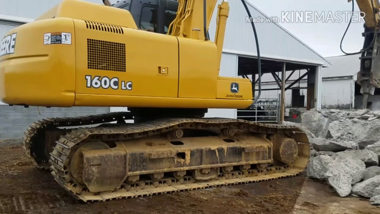 Demolition of The harvestore Silo base using the John Deere 160C ...