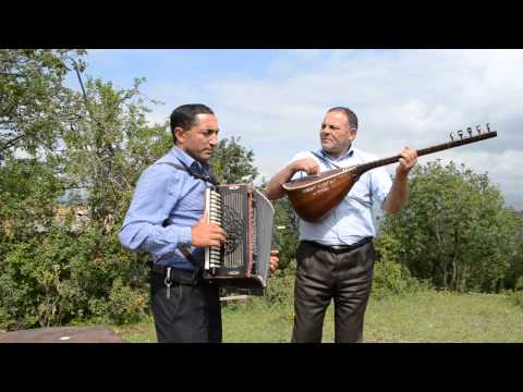 Asiq Sovqat ve Rafiq daskesenli  ƏMİRVAR KƏNDİ YASTI QAYA
