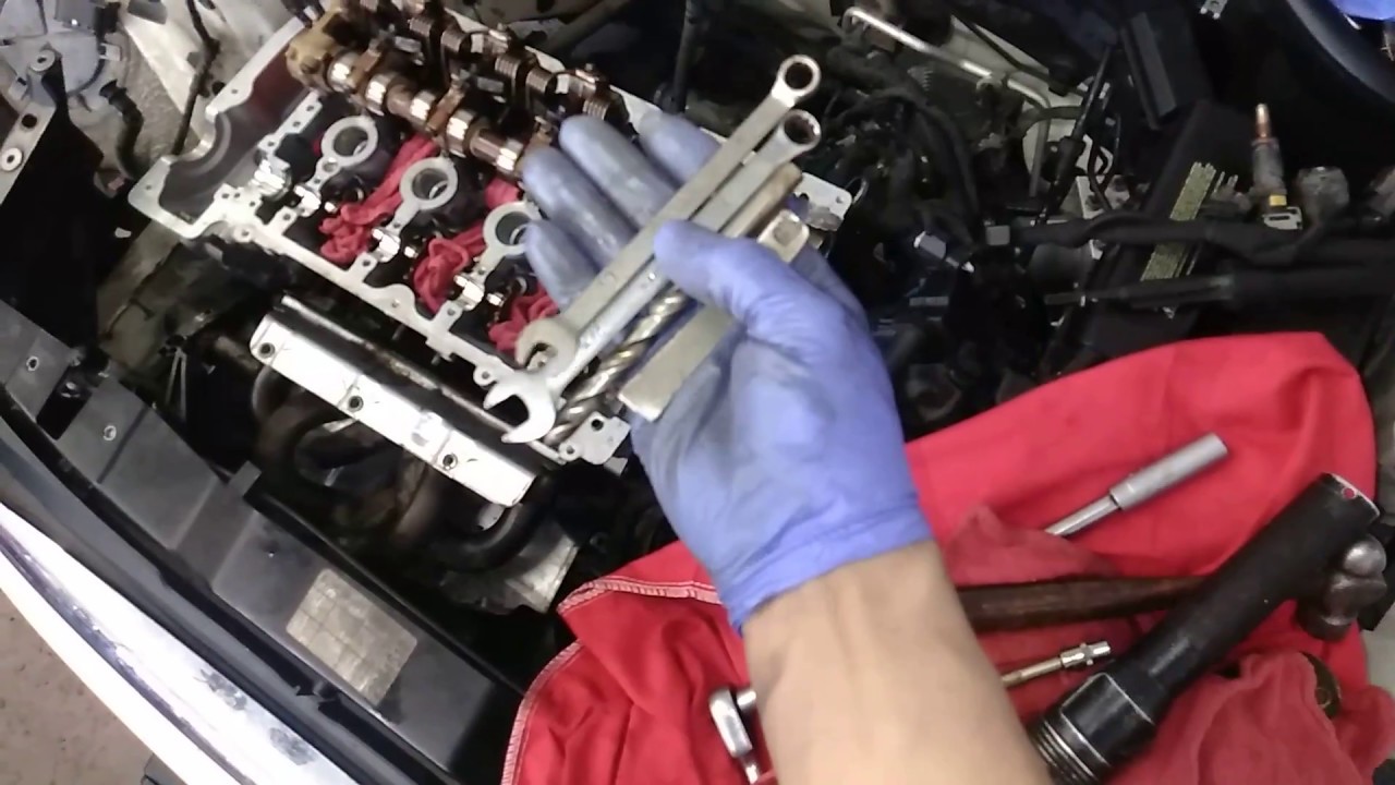 2010 mini Cooper Rocker arm spring install - YouTube