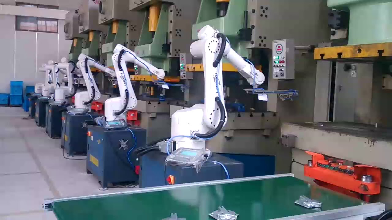 Robot group part handling on punches02 - YouTube