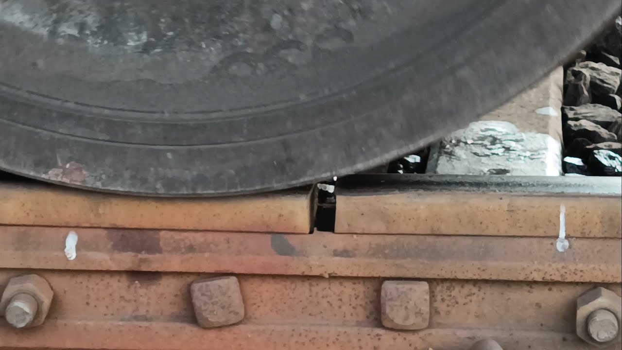 Train Wheel Rolling on Rail Track Joint Gap - YouTube