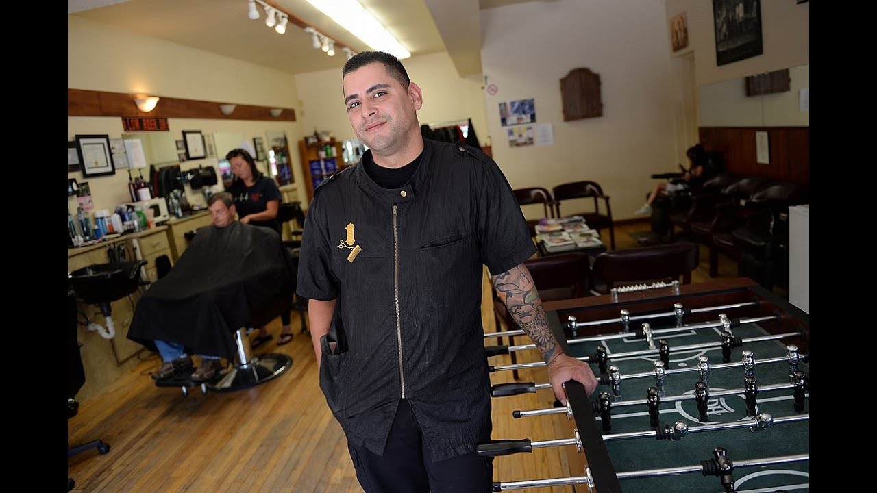 Foosball barber offers free haircuts - YouTube
