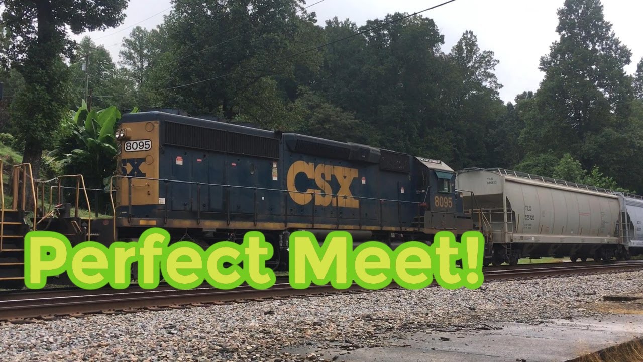 Perfect meet on the Clinchfield! CSX M692 with a SD40-2 and M653 - YouTube