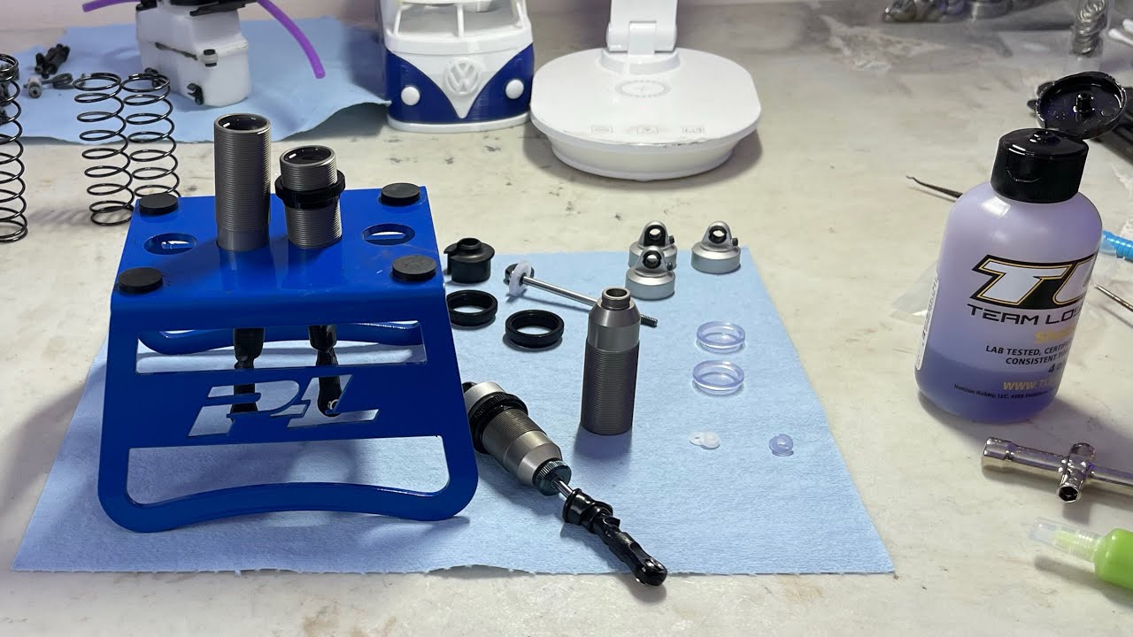 How to rebuild an rc cars shocks - YouTube