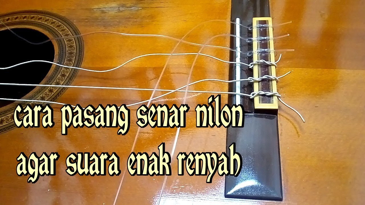 cara memasang senar nilon gitar akustik - YouTube