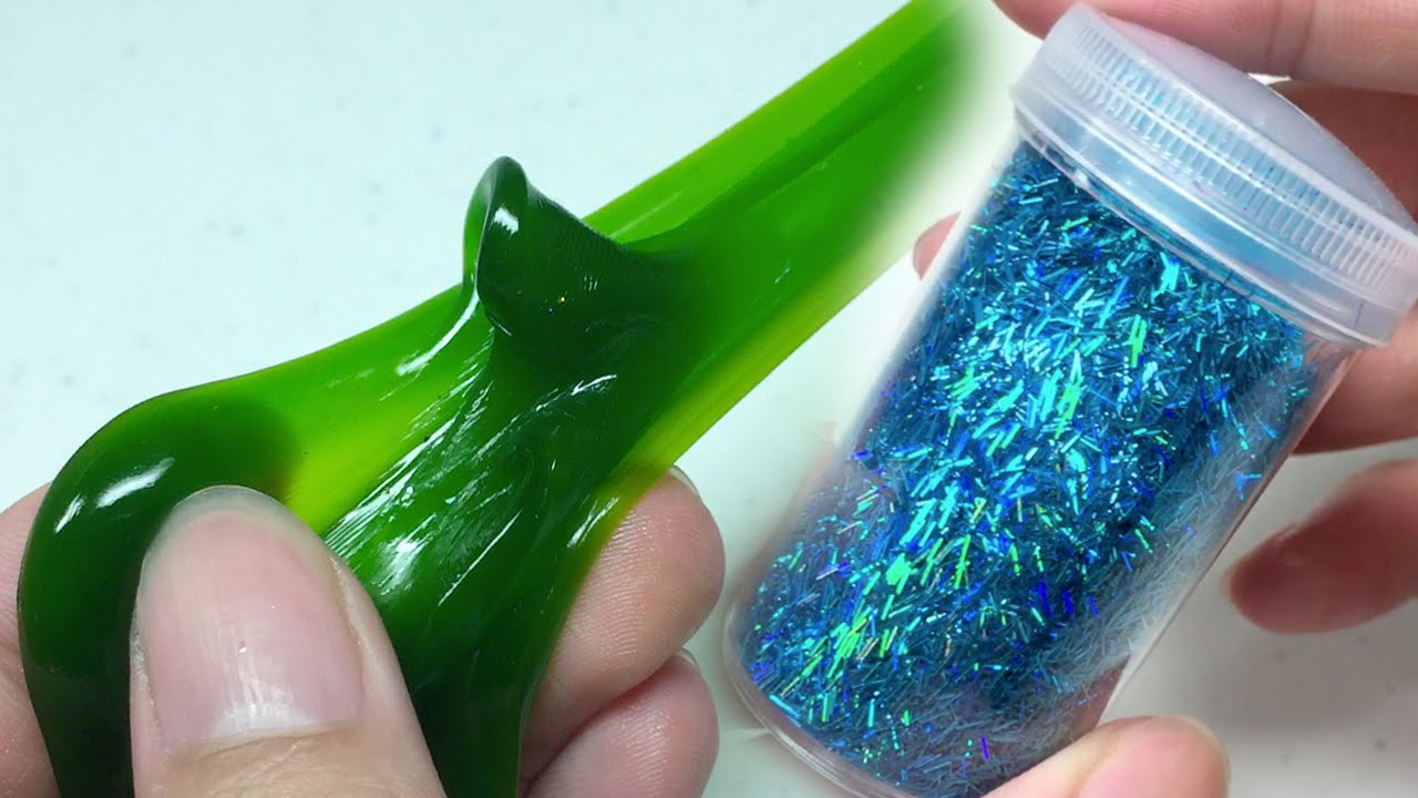 Ice Blue Glitter Vs Green Slime Putty - Elieoops - YouTube