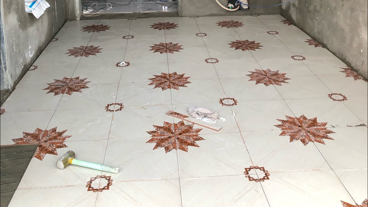 How to install floor tiles 16" X 16" - YouTube