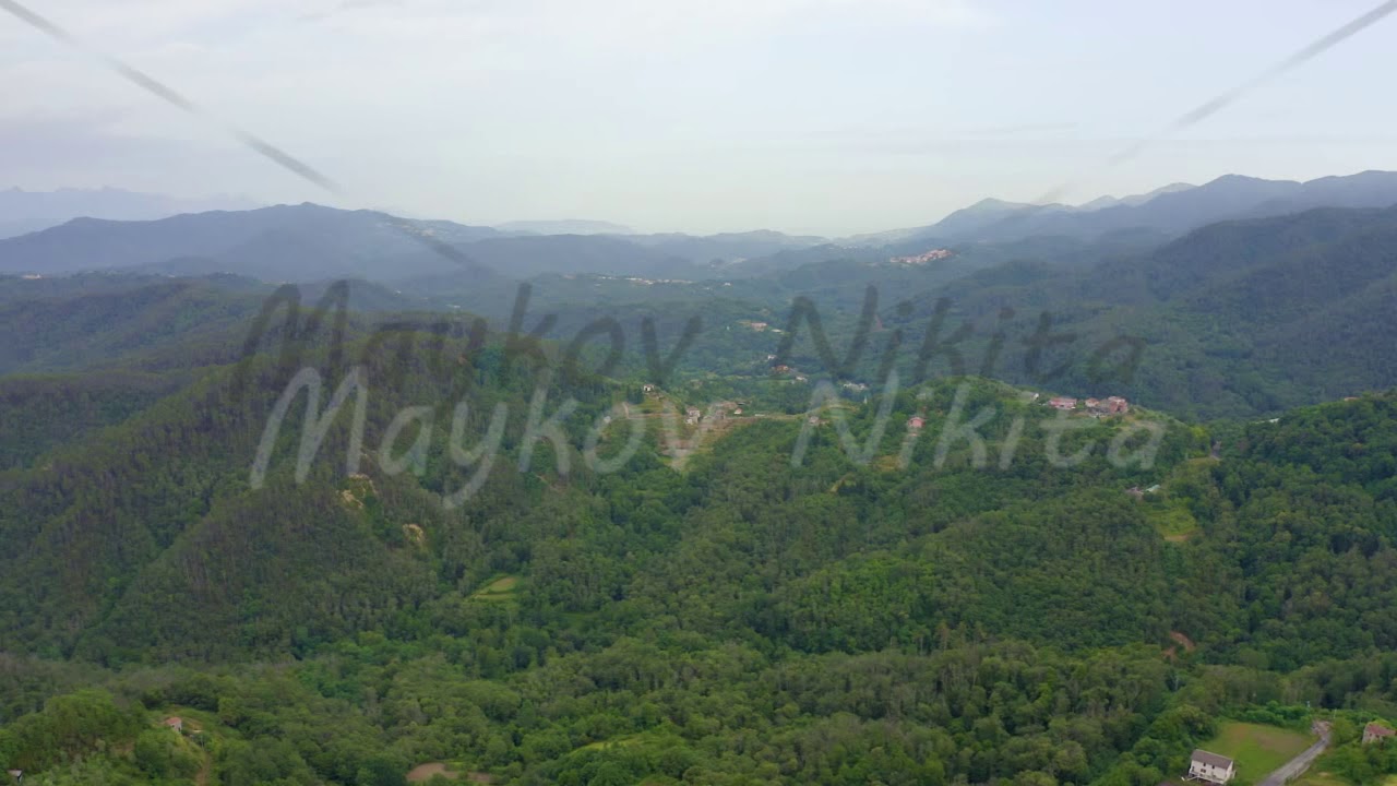 Italy. Forest covered mountains and villas. The territory of Pignone in ...