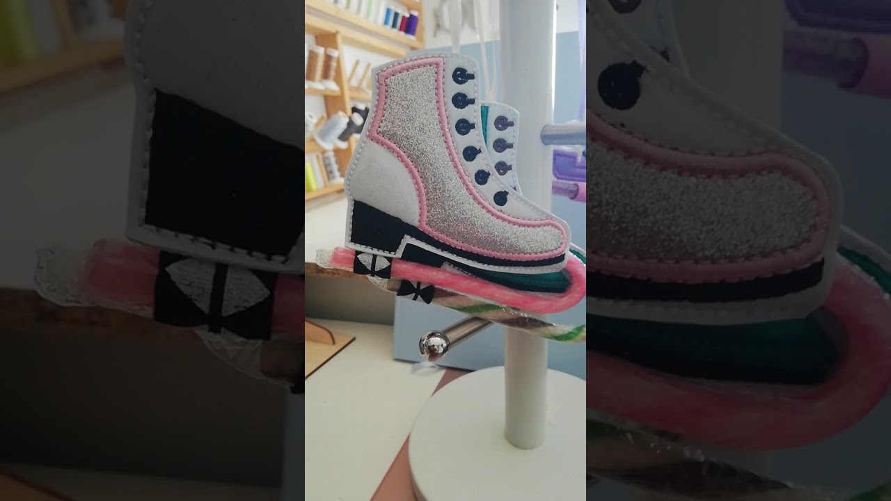 Adding a candy cane to the ice skate hanging decoration - YouTube