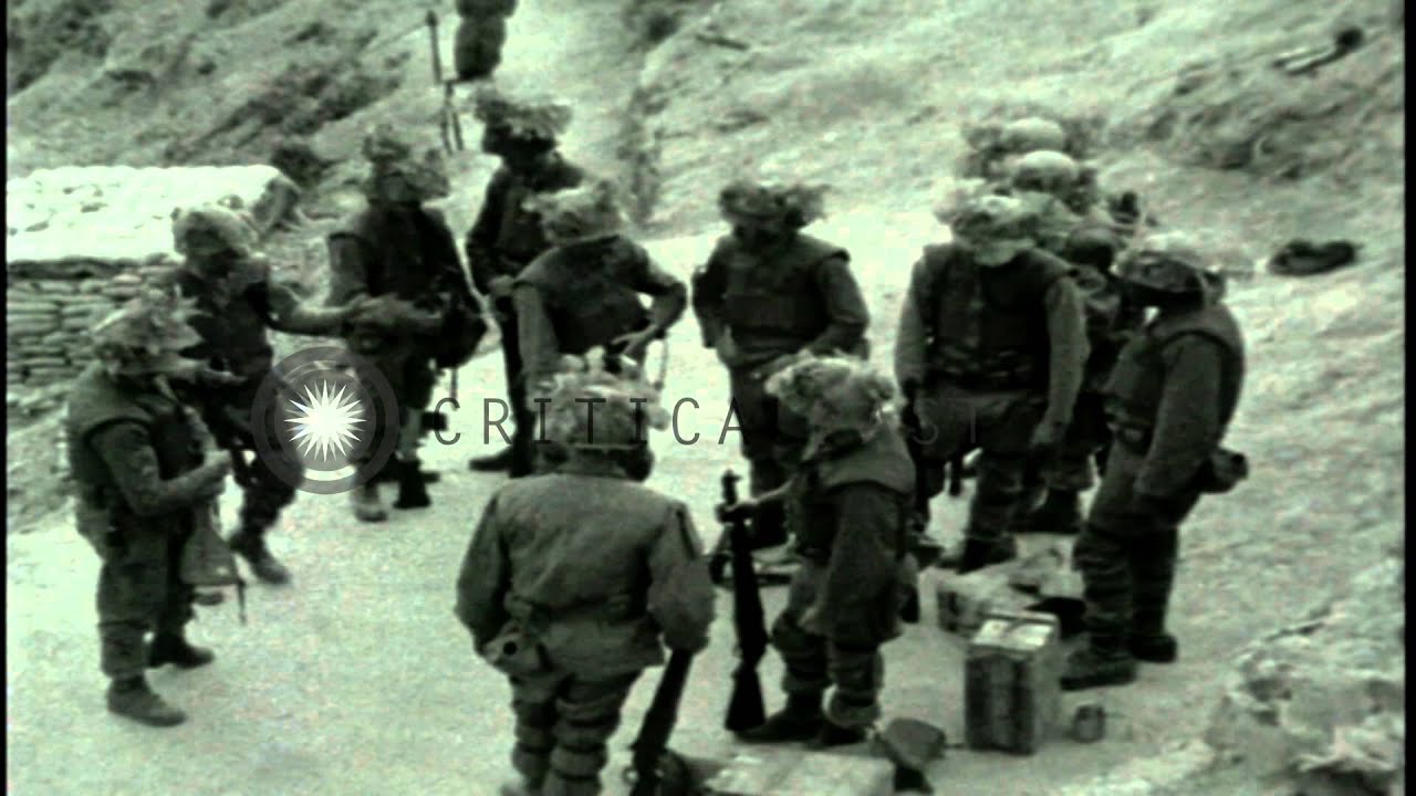 45th Infantry Division soldier of the US Army checks war equipment at a ...
