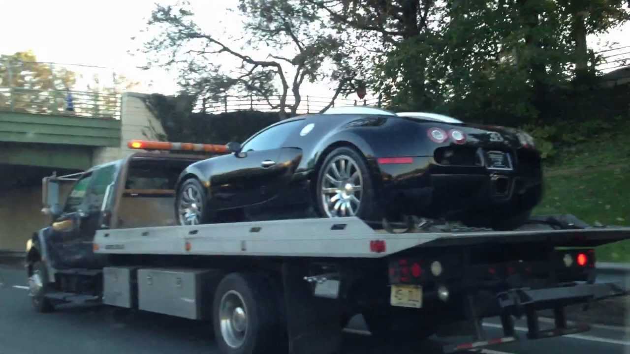 Bugatti veyron EB 16.4 crash fail flat bed towed shot w/ iPhone 4s ...