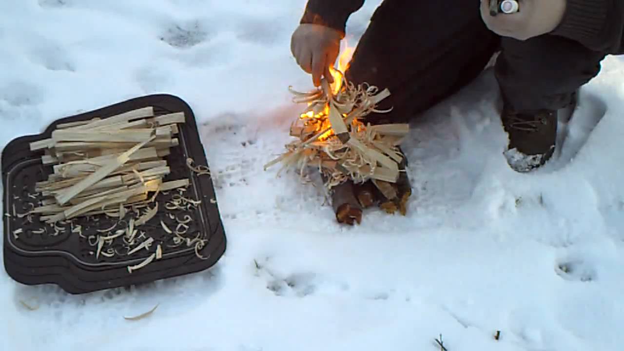 how to make a fire in snow - YouTube