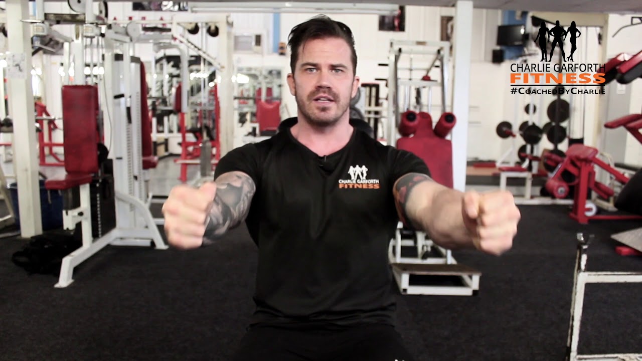 Seated Front Raises - Front Delts - Shoulders Exercise Video Tutorial ...