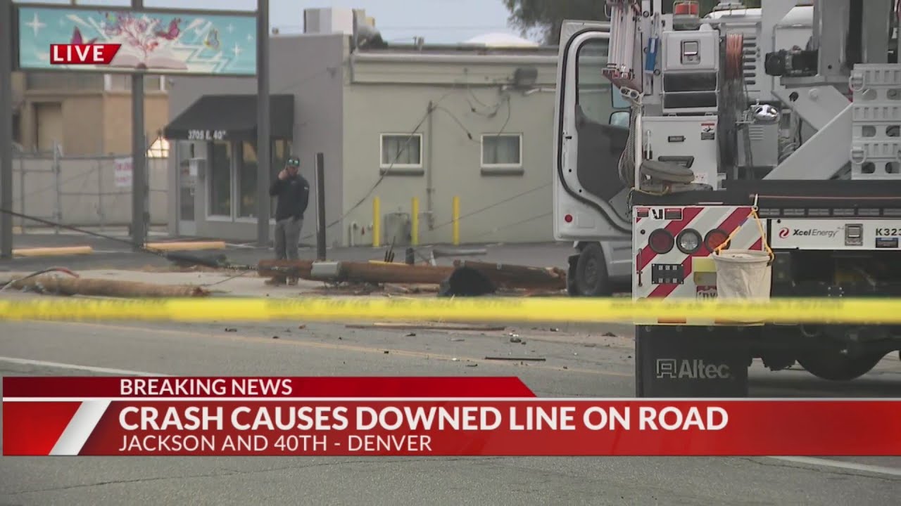 Vehicle crash causes downed power line - YouTube